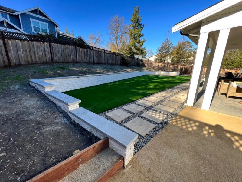 Belgard Paver and MSI Stone Wall Outdoor Makeover | FG Pavers and Turf
